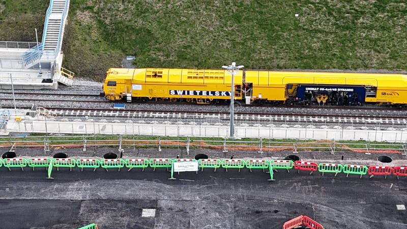 Aerial View of a Yellow Train on the Tracks at EWR Winslow Station ...