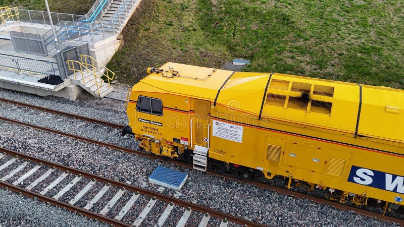 Aerial View of a Yellow Train on the Tracks at EWR Winslow Station ...