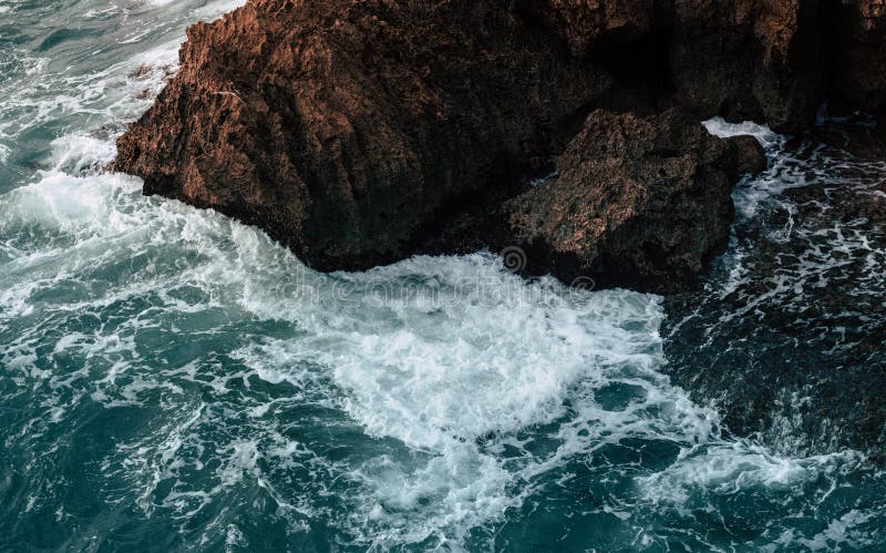 Aerial Wave Breaking Blue Water Ocean on the Rock Cliffs Stock Image ...