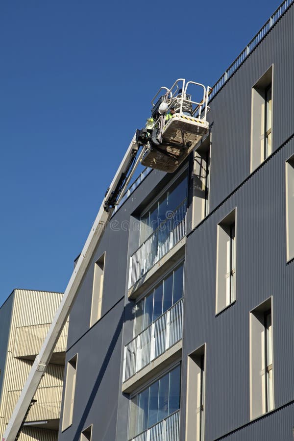 Aerial Work Platform on a Metal Cladding Installation Site of a ...