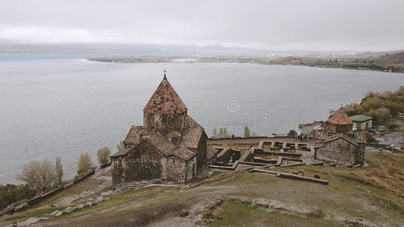 Aerial Zoom in View of the Sevanavank Monastery and Chapel Overlooking Famous Sevan Lake at ...