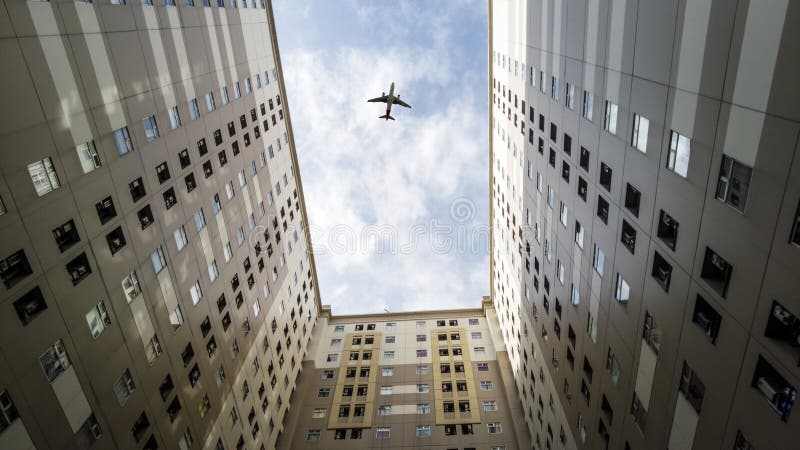 Aero Plane Flying Above High Rise Building Apartment Stock Photo ...