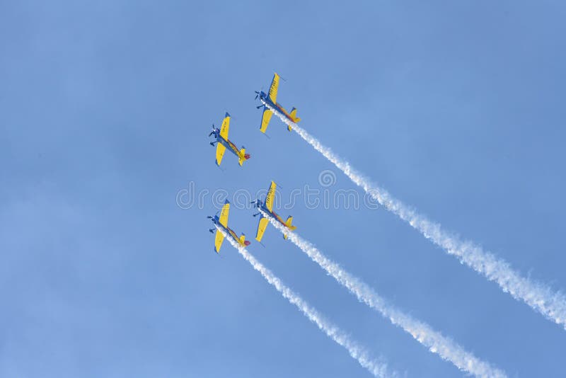 Aerobatic Air Plane on Blue Sky, Aerobatic Pilots Synchronise Editorial ...