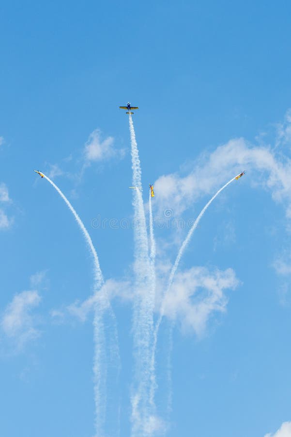 Aerobatic Air Plane on Blue Sky, Aerobatic Pilots Synchronise Editorial ...