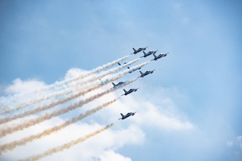 Aerobatic Aircraft with Colored Smoke Stock Image - Image of aerobatic ...