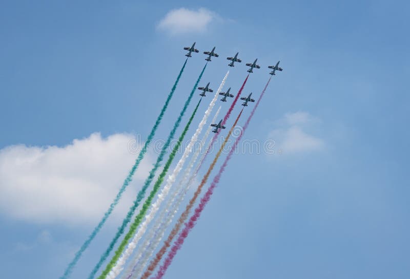 Aerobatic Aircraft with Colored Smoke Stock Photo - Image of monoplane ...