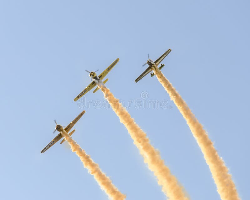 Aerobatic Pilots Training in the Blue Sky, Airplanes with Colored Trace ...