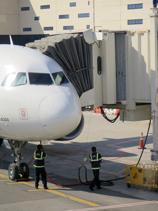 Aerobridge in plane parked stock image. Image of terminal - 32073833