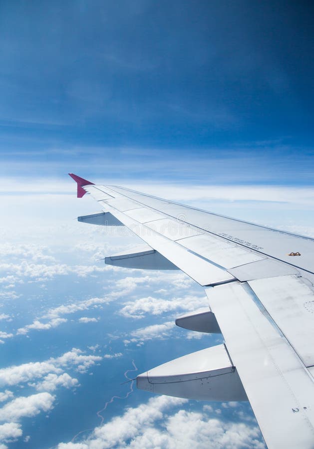 Aeroplane wings stock photo. Image of turbine, cloud - 39485854