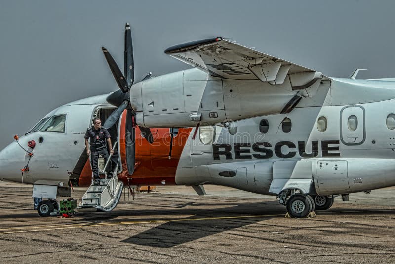 An Aerorescue Plane and Pilot Editorial Image - Image of airplane ...