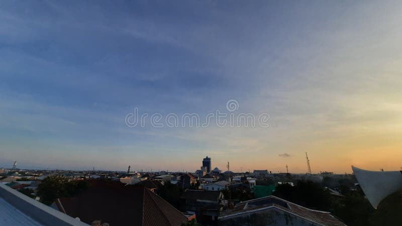 Aesthetic City Views with a Lit Sunset Sky Decorated with Aesthetic ...