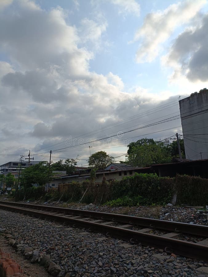 Aesthetic View of Clouds on the Edge of the Railroad Tracks Stock Photo ...