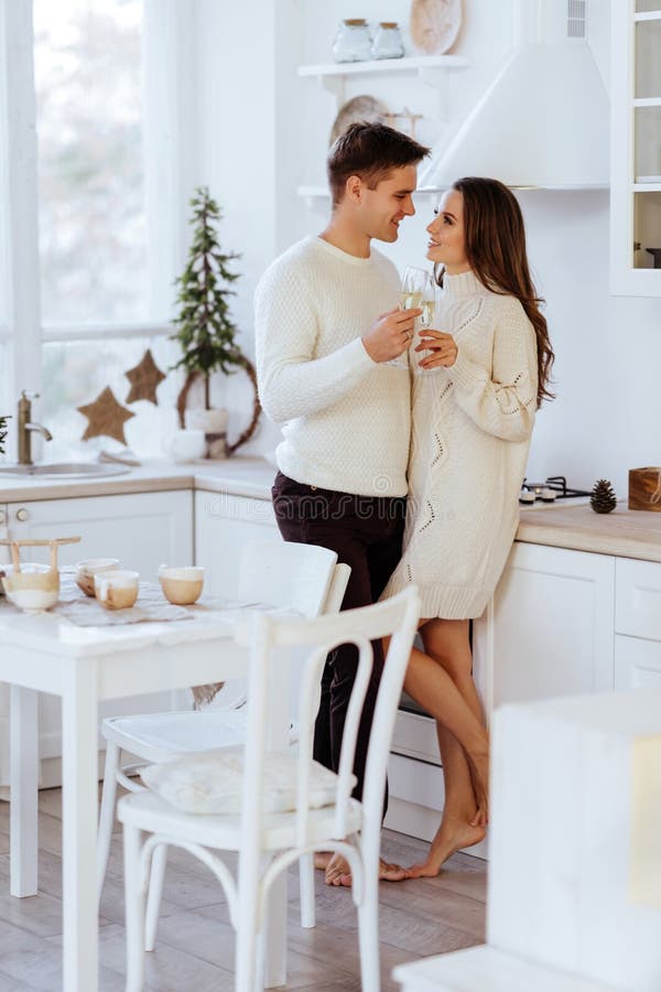Affectionate Couple Hugging in Kitchen Stock Photo - Image of holiday ...