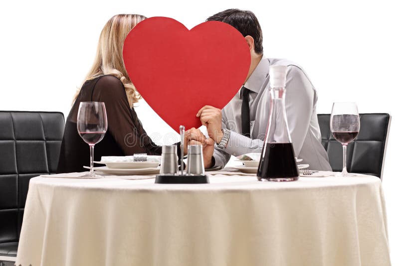 A Couple Kissing on a Bench Stock Image - Image of life, casual: 136691