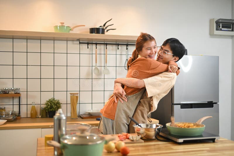 Affectionate Young Couple Cooking Healthy Breakfast Together and ...