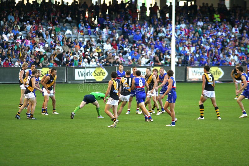 AFL football editorial photo. Image of ball, players, grandstand - 5184161