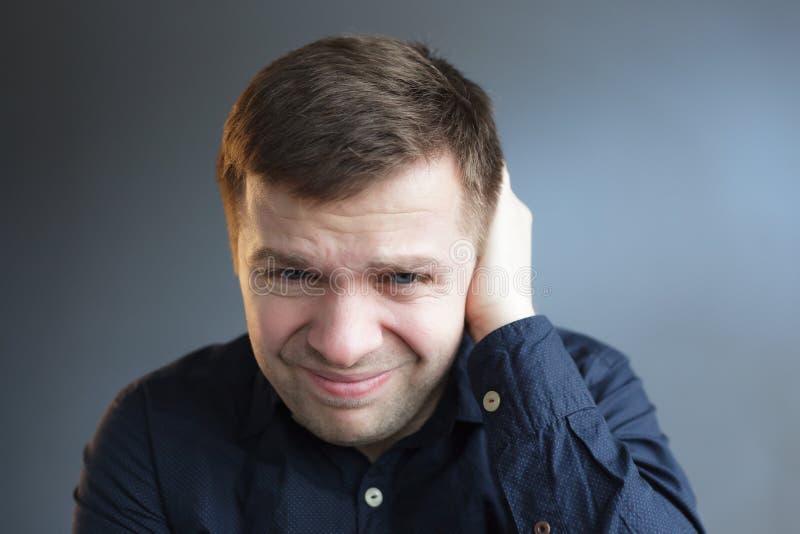 Afraid of sharp sounds stock photo. Image of painful - 86161714