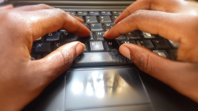 2 Africa Hands Typing on a Laptop`s Keypad Stock Image - Image of ...
