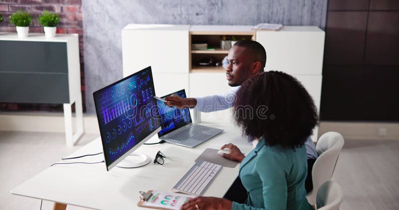 African American Analyst Using Financial Business Data Stock Photo ...
