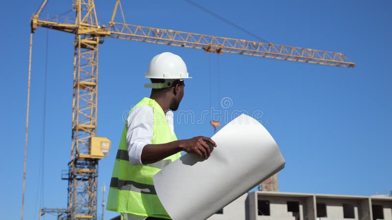 African American Architect Compares Building To Drawings Stock Video ...