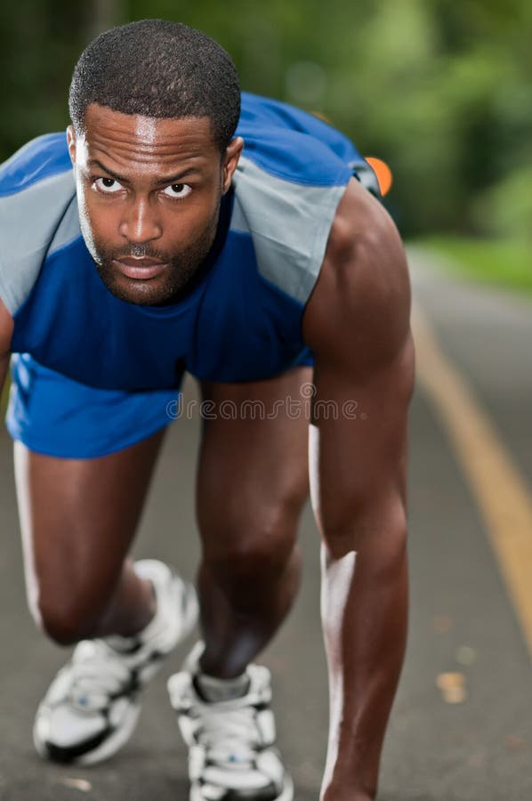 African American Athlete Running on a Wooded Path Stock Image - Image ...