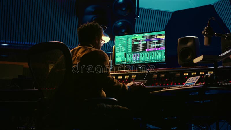 African American Audio Engineer Uses Greenscreen on Pc Stock Footage ...