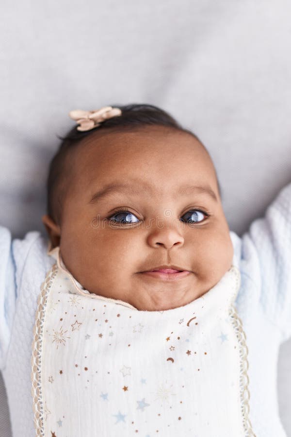 African American Baby Lying on Bed at Bedroom Stock Image - Image of ...