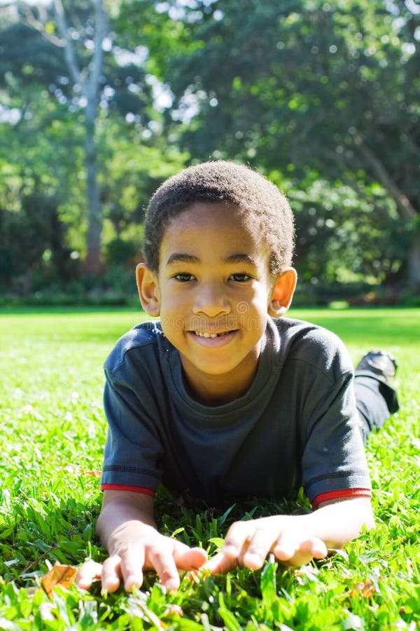 African american boy stock image. Image of daytime, grass - 9415587