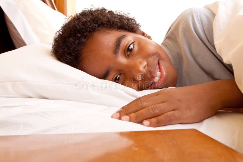 African American Boy Sleeping in His Bed. Stock Photo - Image of modern ...