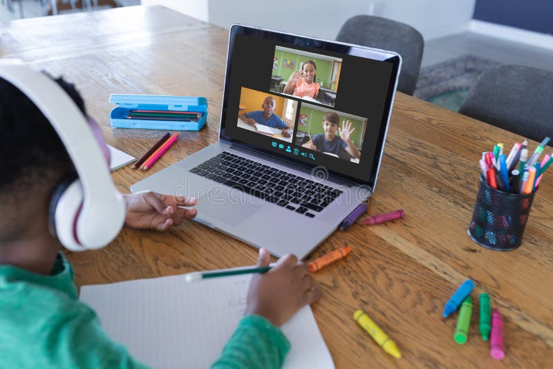African American Boy Using Laptop for Video Call, with Diverse ...