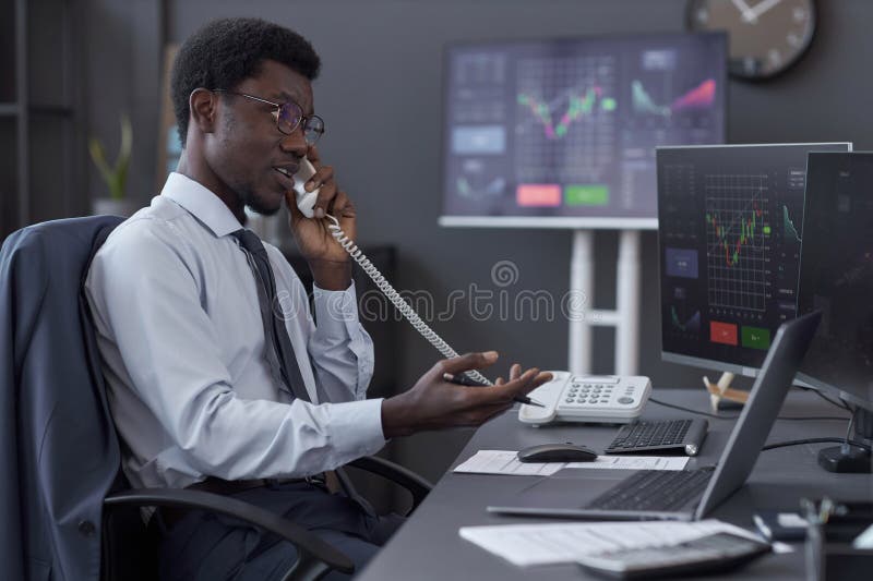 African American Broker Having a Call on the Phone Stock Image - Image ...
