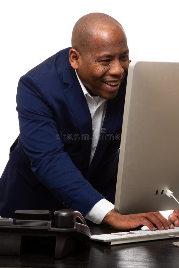 African American Businessman Looks at Computer Stock Image - Image of ...