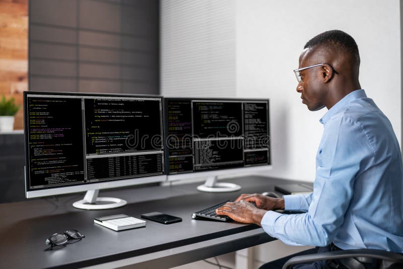 African American Coder Using Computer at Desk Stock Photo - Image of ... African American Coder Using Computer at Desk Stock Photo - Image of ...