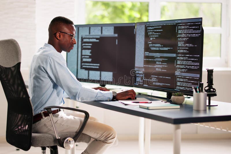 African American Coder Using Computer at Desk Stock Photo - Image of ... African American Coder Using Computer at Desk Stock Photo - Image of ...