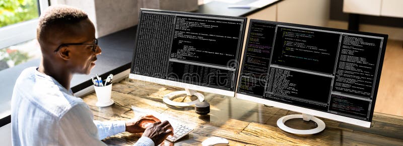 African Coder Using Multiple Computer Screens Stock Photo - Image of ...