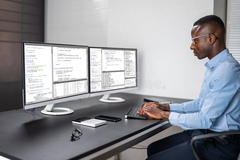 African American Coder Using Computer at Desk Stock Photo - Image of ... African American Coder Using Computer at Desk Stock Photo - Image of ...