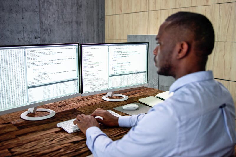 African American Coder Using Computer at Desk Stock Photo - Image of ... African American Coder Using Computer at Desk Stock Photo - Image of ...