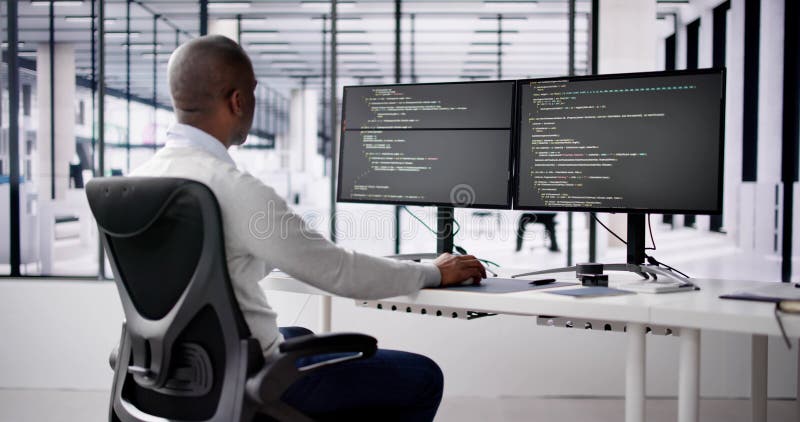 African American Coder Using Computer at Desk Stock Image - Image of ... African American Coder Using Computer at Desk Stock Image - Image of ...