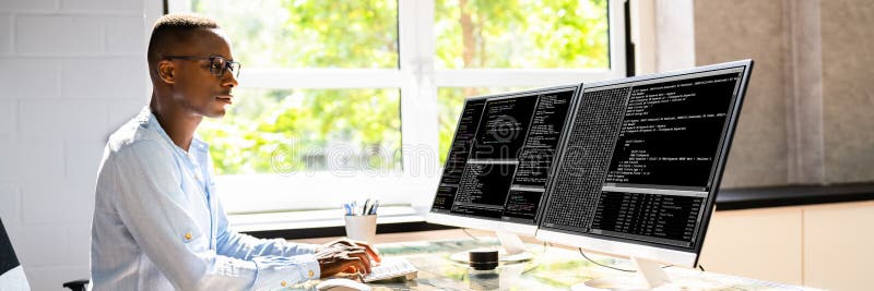 African Coder Using Multiple Computer Screens Stock Photo - Image of ... African Coder Using Multiple Computer Screens Stock Photo - Image of ...