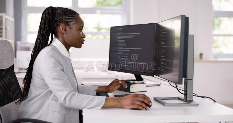 African American Coder Using Computer at Desk Stock Image - Image of develop, monitor: 287608929