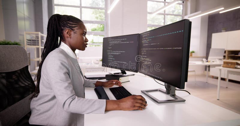 African American Coder Using Computer at Desk Stock Photo - Image of coding, monitor: 288303248