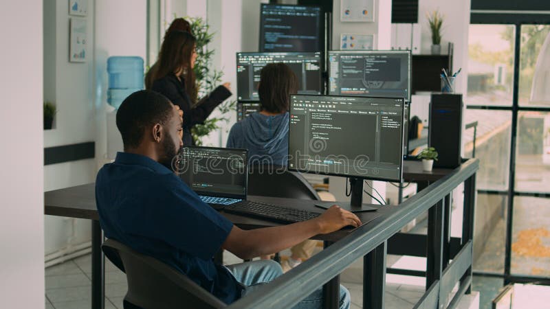 African American Coder Writing Programming Language On Computer Stock Image Image Of