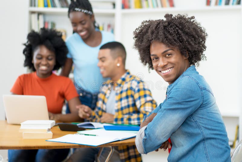 African American Computer Science Student with Group of Students Stock ...