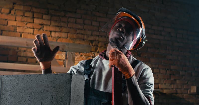 African American Contractor Singing during Work Stock Footage - Video ...
