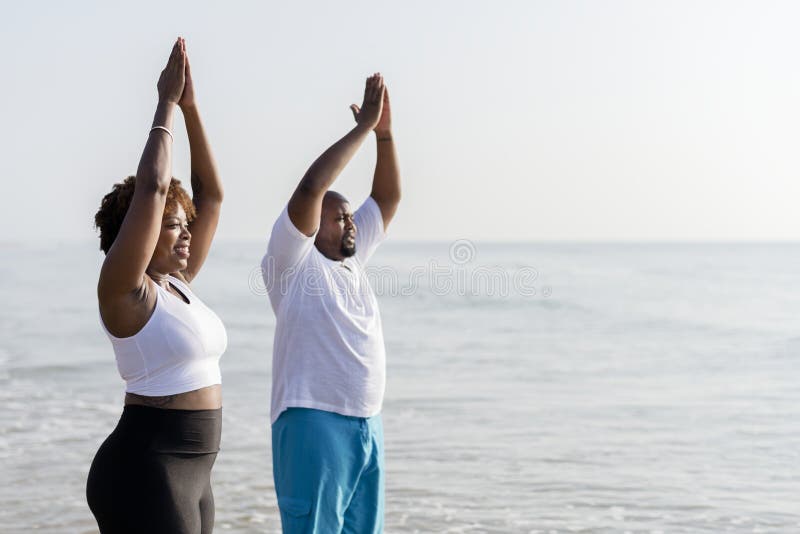 African American Couple Working Out at the Beach Stock Photo - Image of ...
