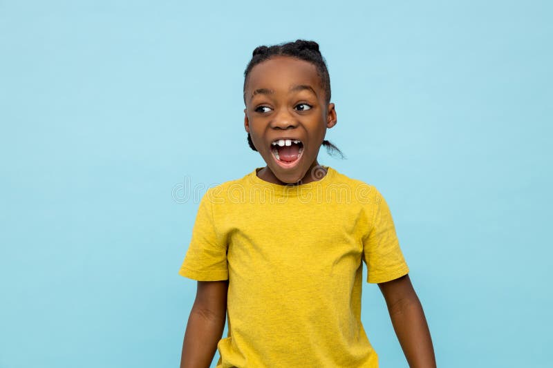 African American Cute Boy Looking Excited and Contented Stock Image ...