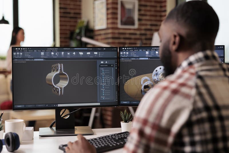African American Developer Setting Up Gears Model Stock Photo - Image ...