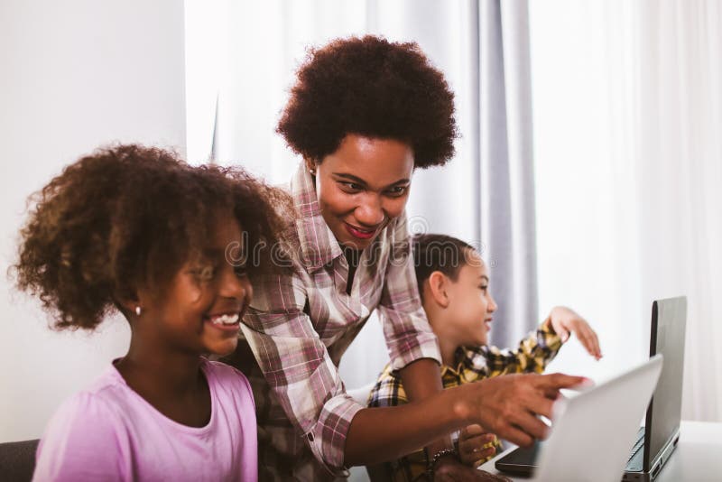 African American Elementary Students Using Computer and Following ...
