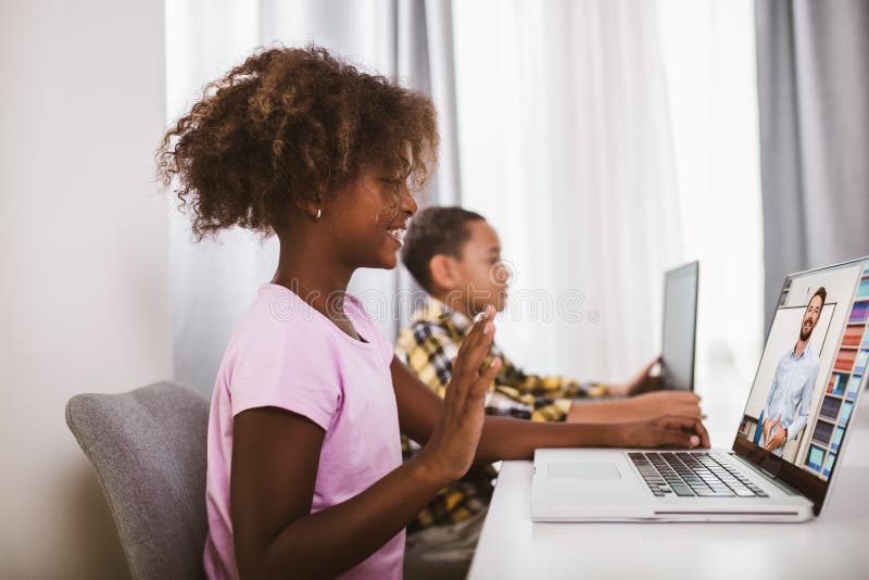 African American Elementary Students Using Computer and Following ...