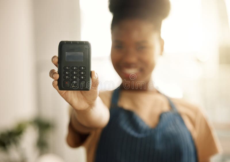 African American Entrepreneur Holding a Nfc Payment Machine. Small ... African American Entrepreneur Holding a Nfc Payment Machine. Small ...